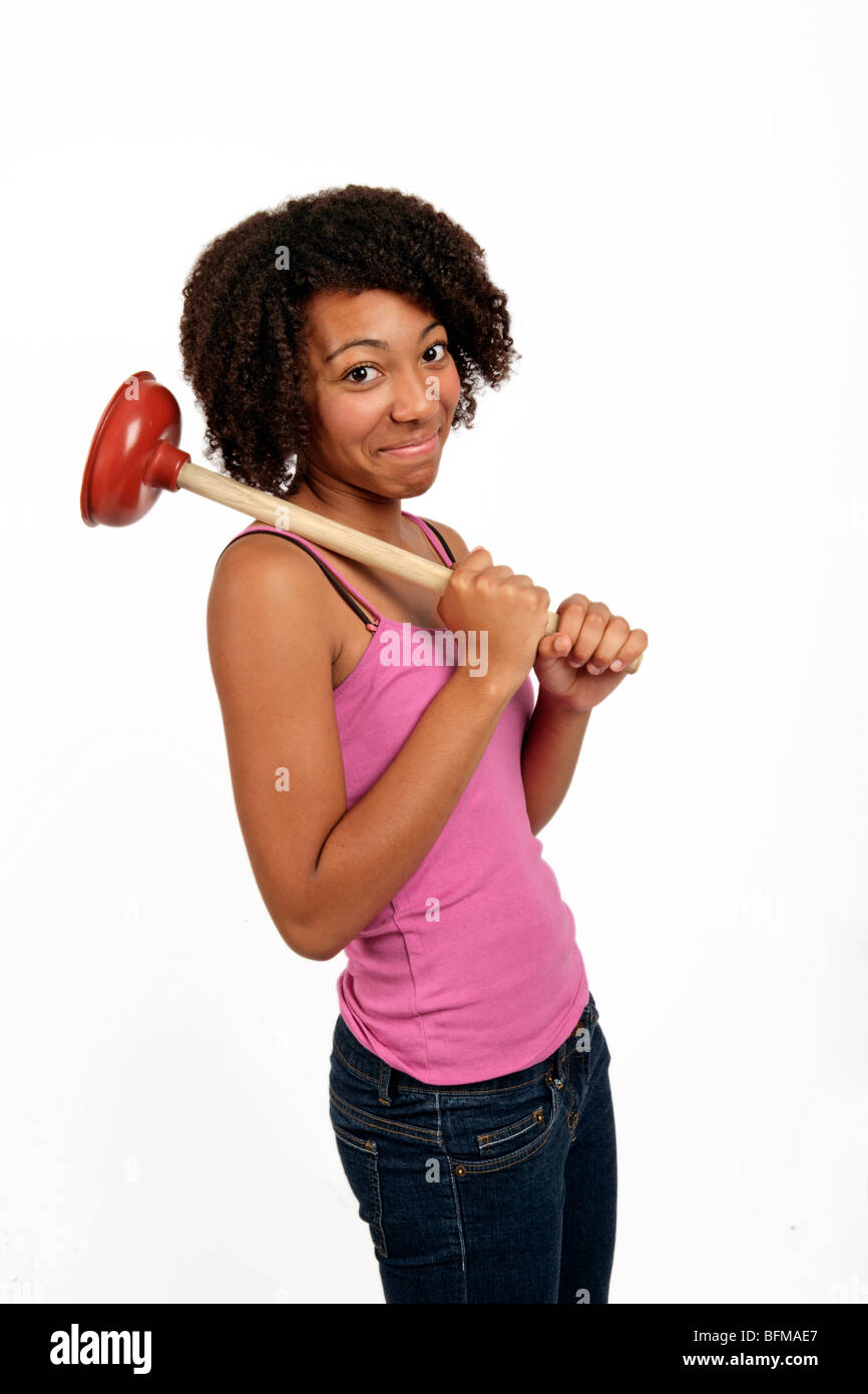 young woman holding a sink plunger apprentice worker or student ...