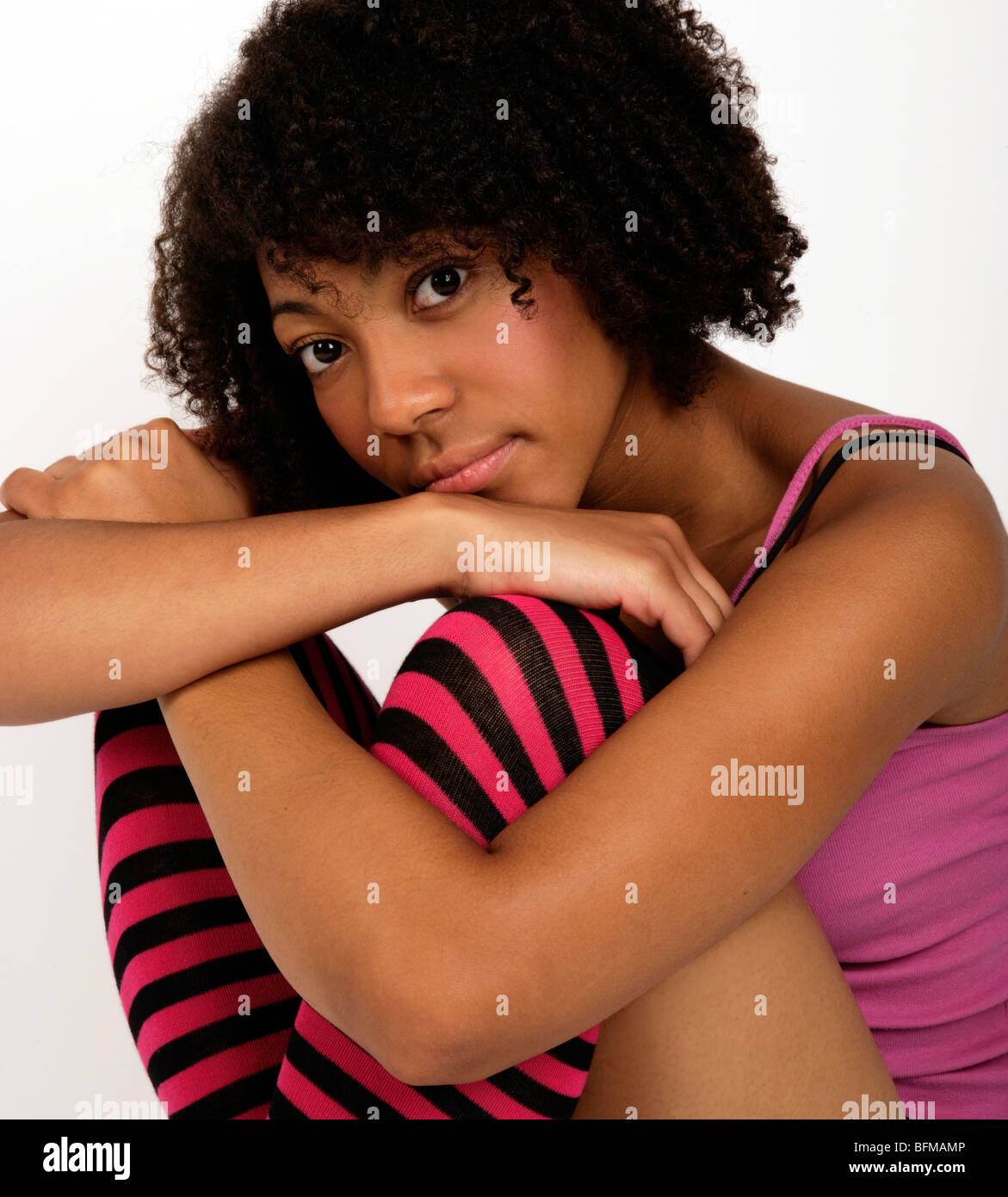 young Cuban girl with a thoughtful pensive expression on her beautiful ...