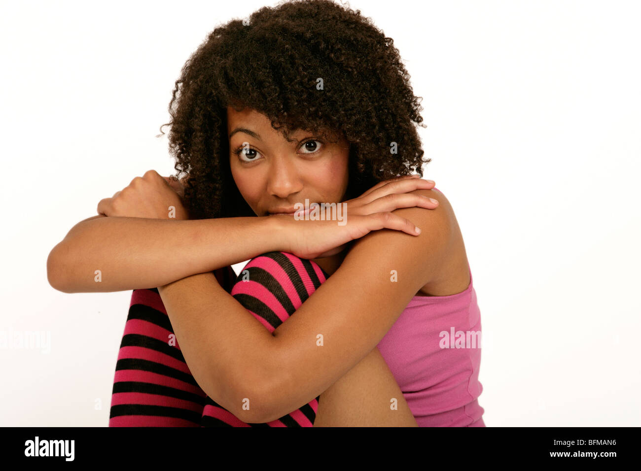young Cuban girl with a thoughtful pensive expression on her beautiful ...