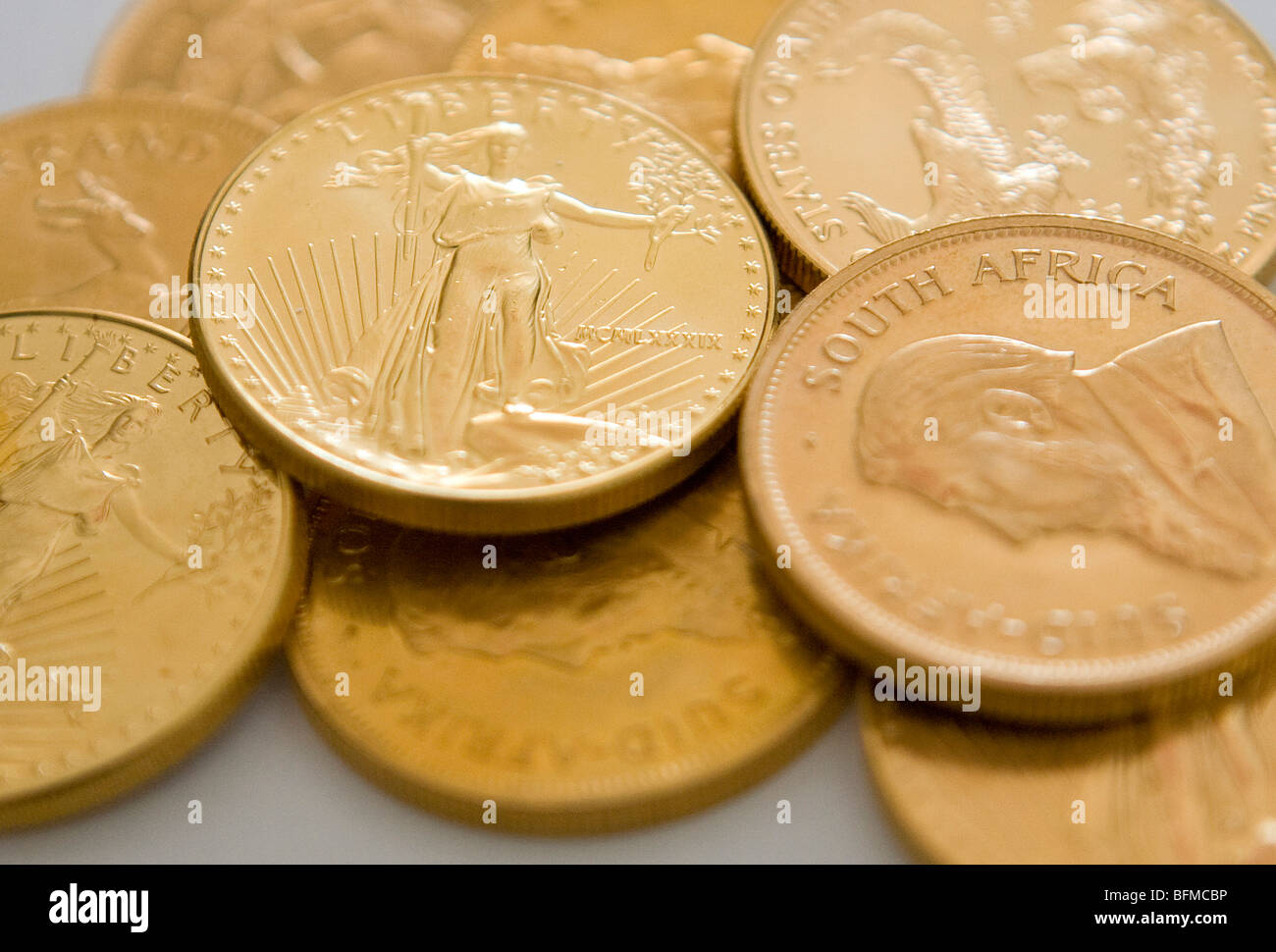 American Eagle, South African Krugerrand and Dutch Guilder gold coins ...