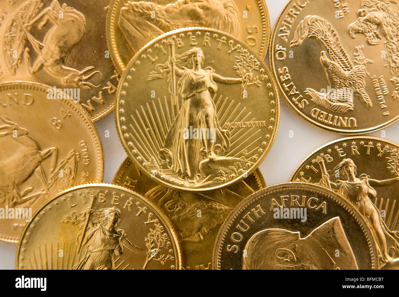 American Eagle, South African Krugerrand and Dutch Guilder gold coins ...