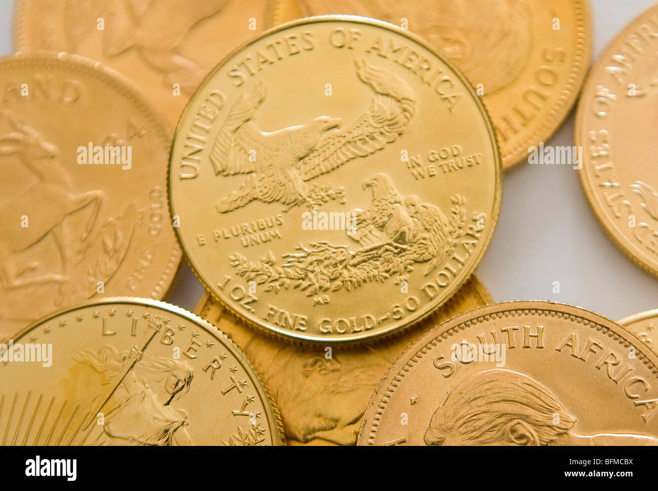 American Eagle, South African Krugerrand and Dutch Guilder gold coins ...