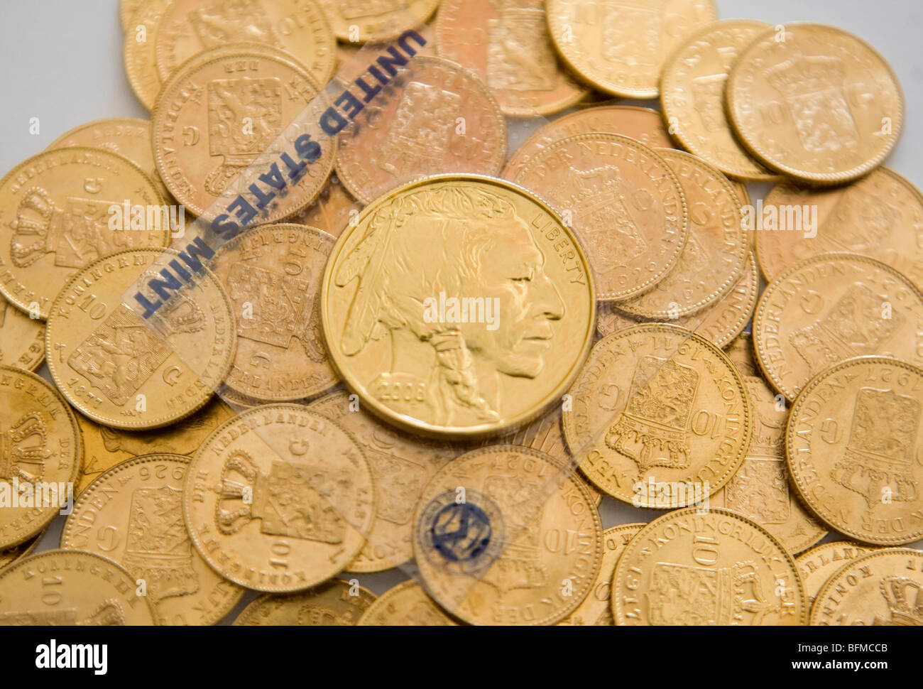 American Eagle, South African Krugerrand and Dutch Guilder gold coins ...