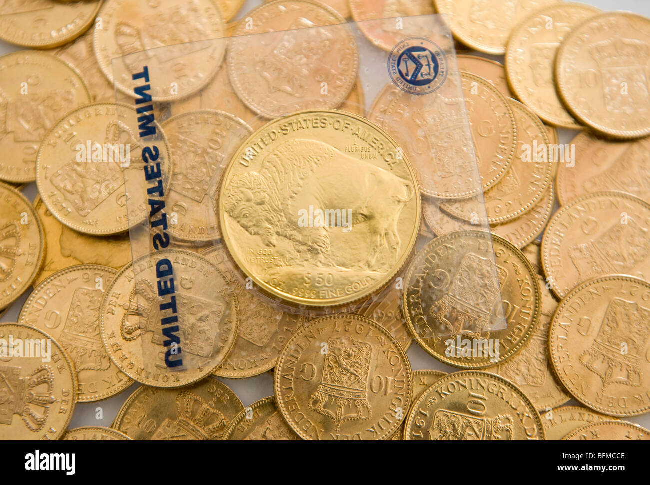American Eagle, South African Krugerrand and Dutch Guilder gold coins ...
