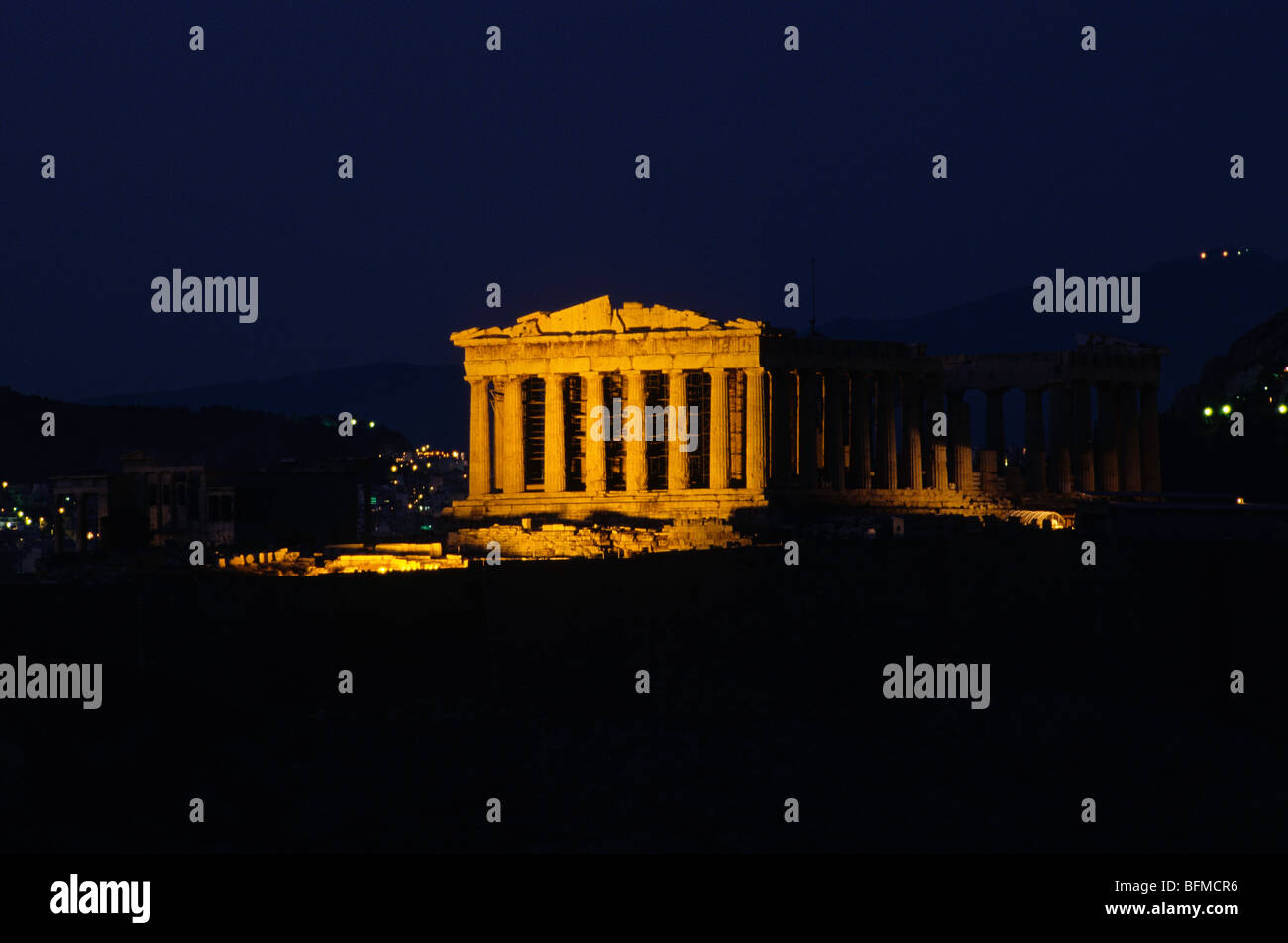 A nighttime shot of the illuminated Parthenon located on the Acropolis ...
