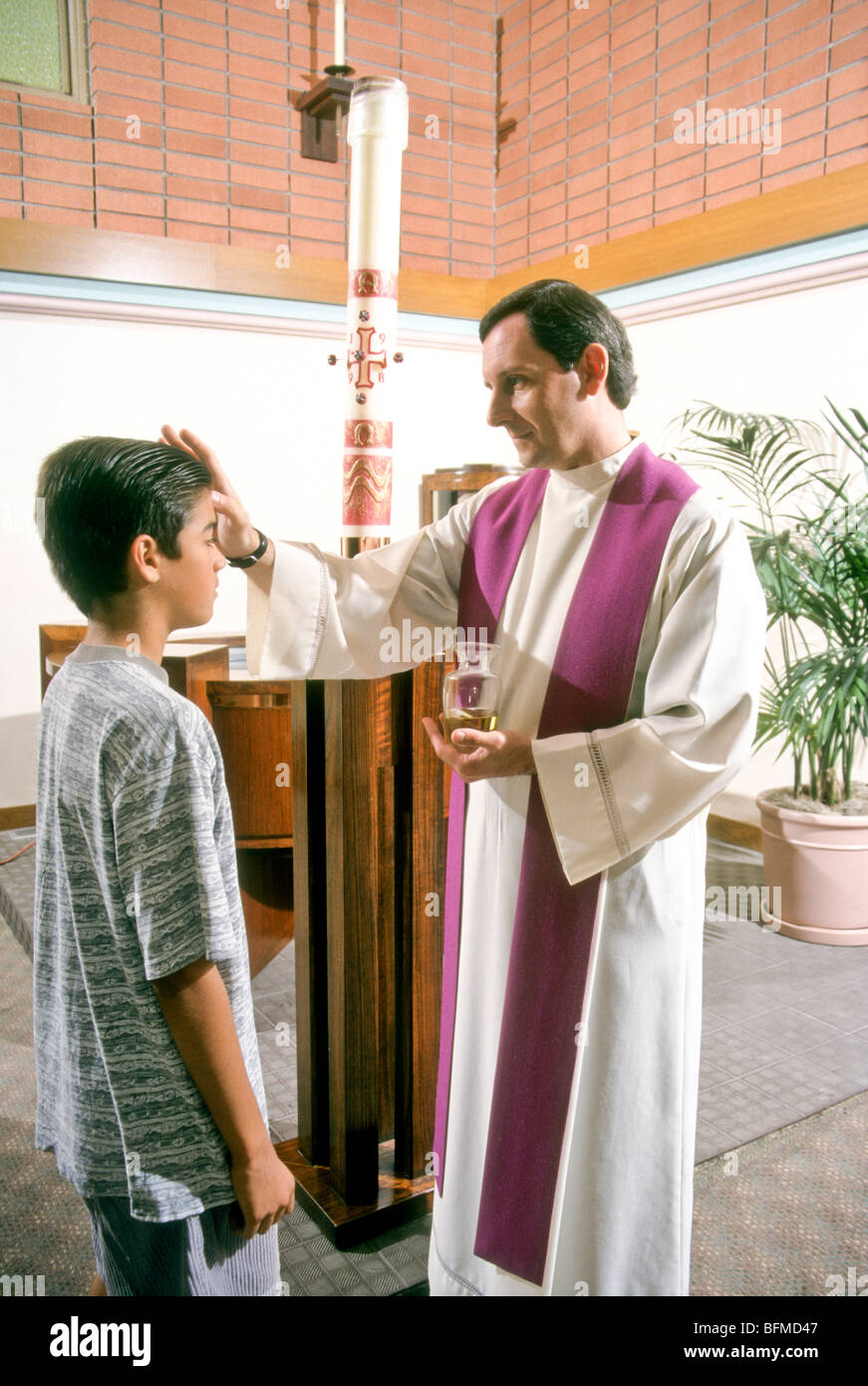 bless holy oil confirmation Stock Photo - Alamy