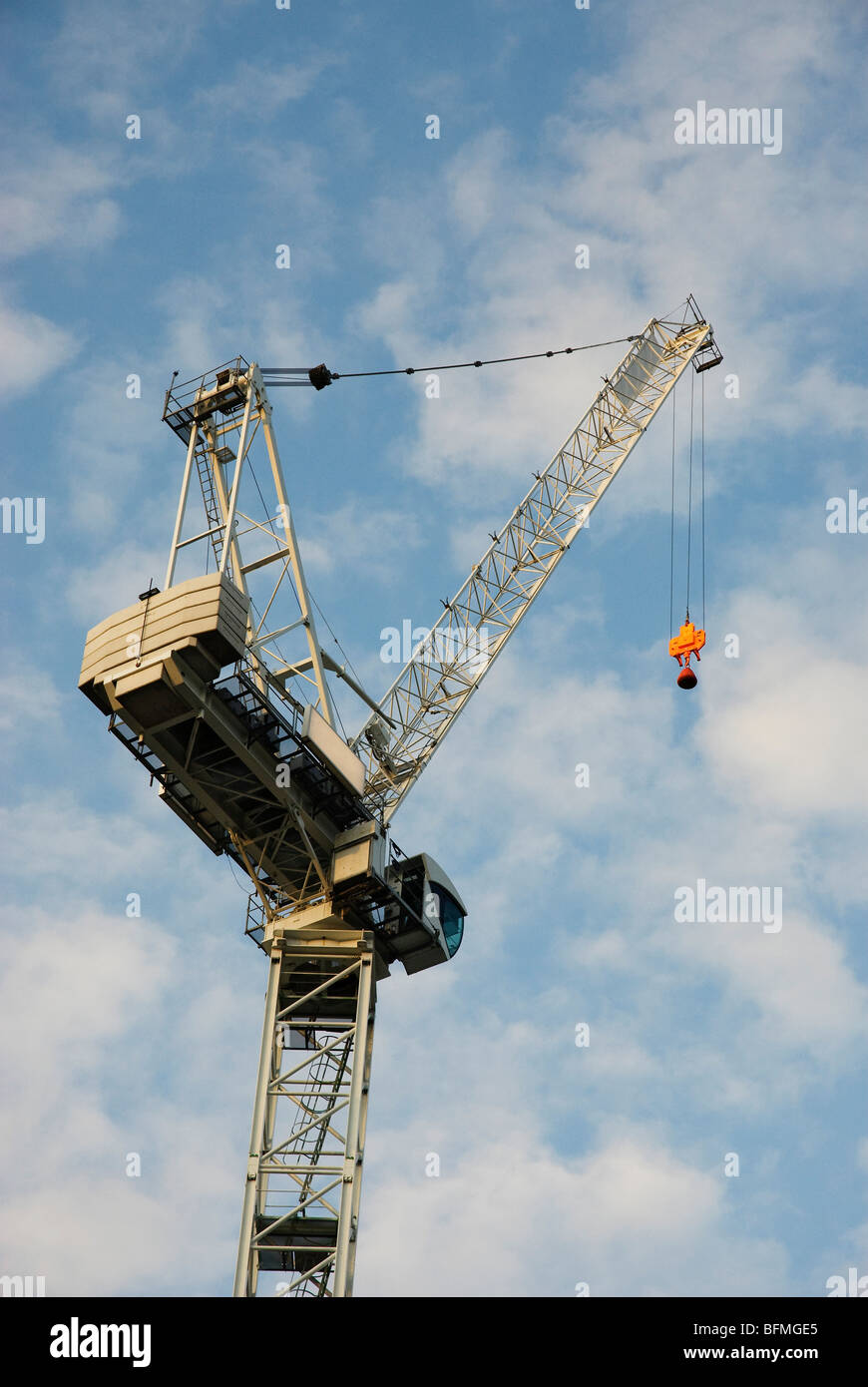 Tall crane against evening summer sky and clouds Stock Photo - Alamy