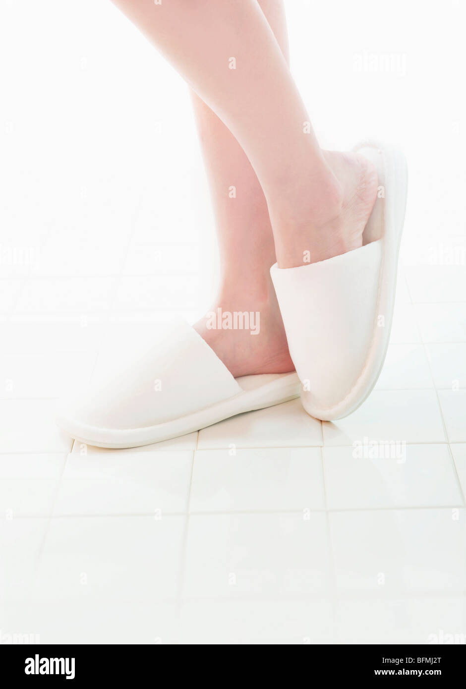 Wearing slippers hi-res stock photography and images - Alamy