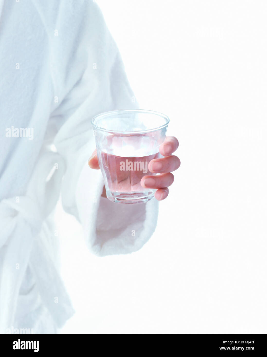 Woman in white robe relaxes hi-res stock photography and images - Alamy