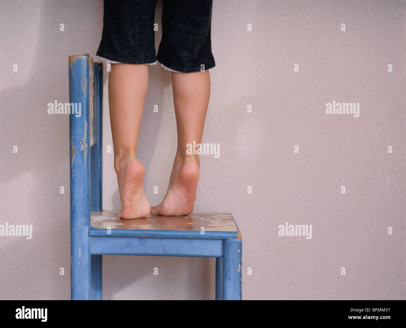 Children feet chair hi-res stock photography and images - Alamy