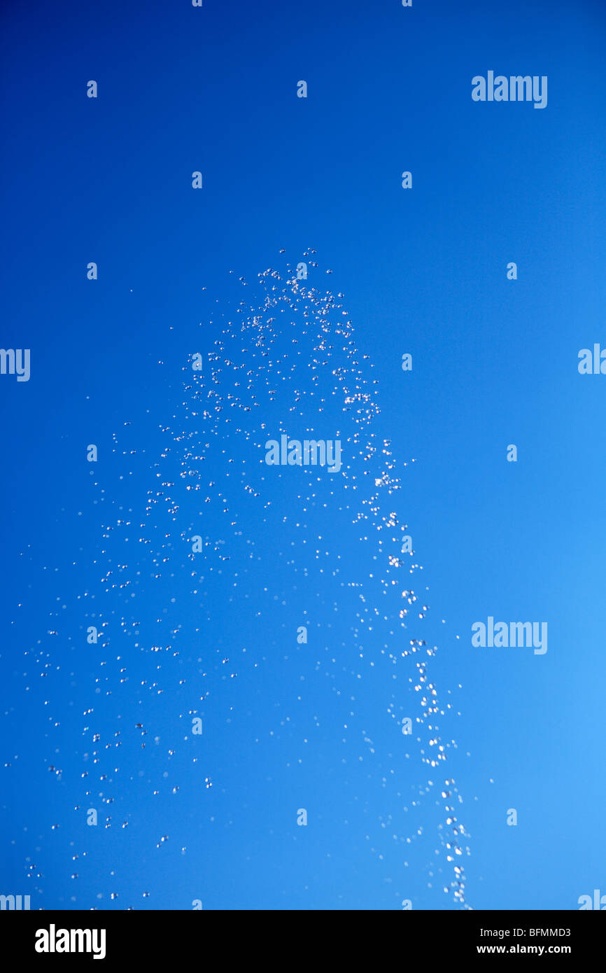 Water drops against blue sky, blue background Stock Photo - Alamy