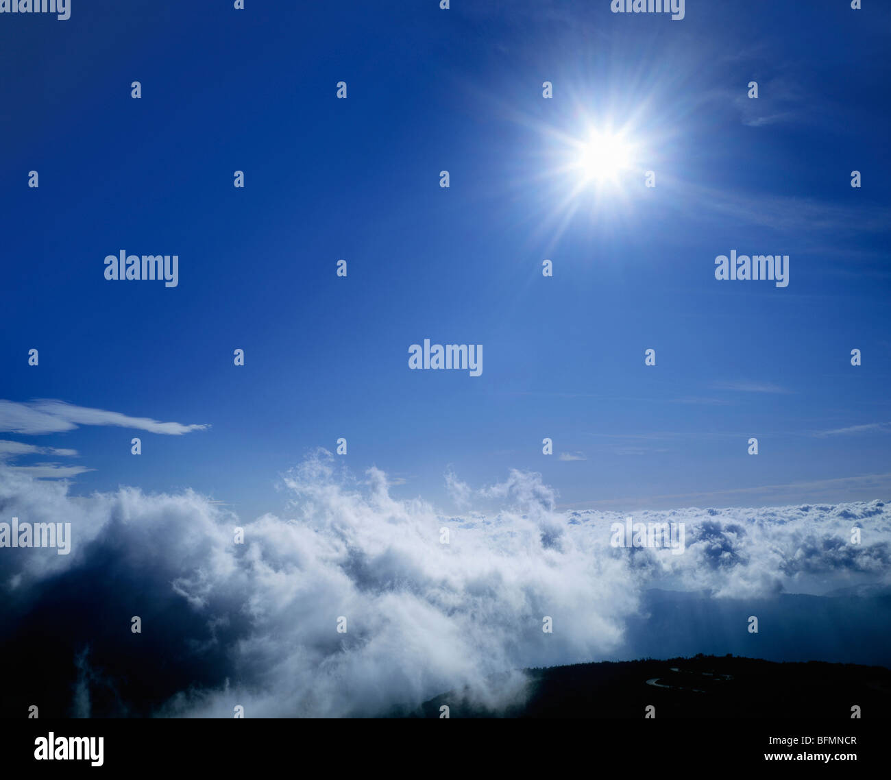 Clouds and sun in blue sky, Nagano prefecture, Japan Stock Photo - Alamy