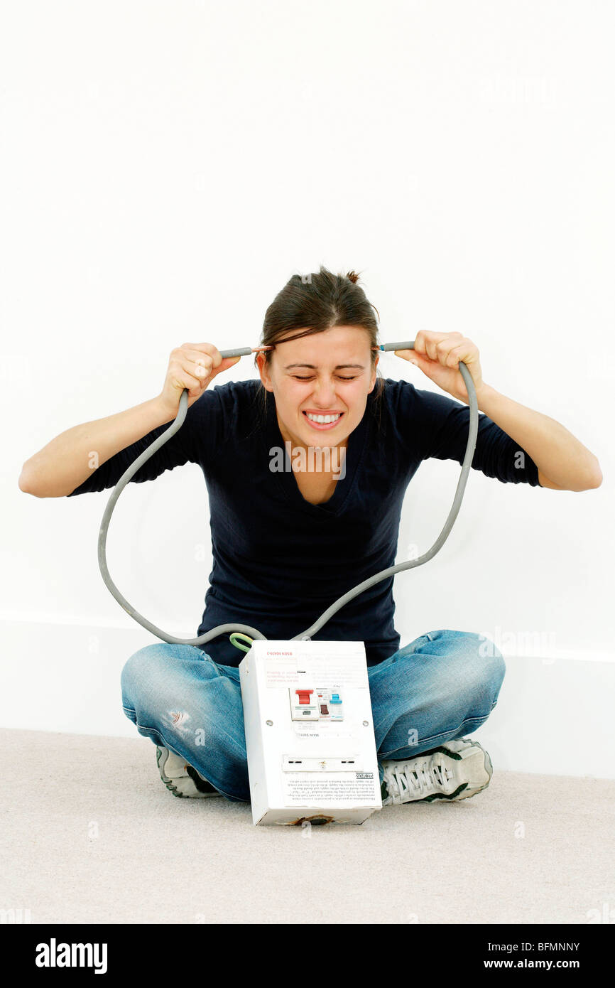 Electrocuting woman silly cables hi-res stock photography and images ...