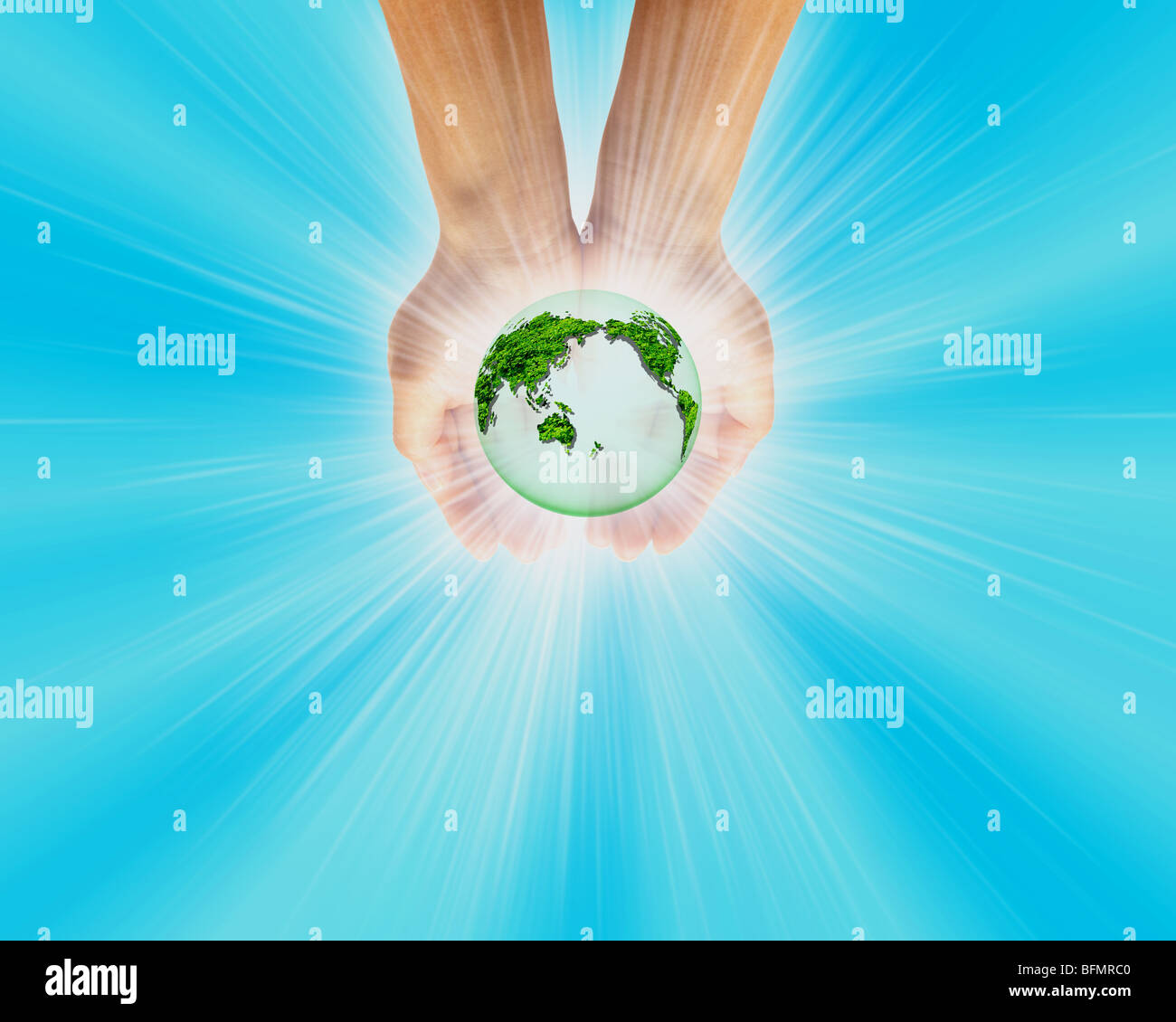 Globe glowing in hands Stock Photo - Alamy