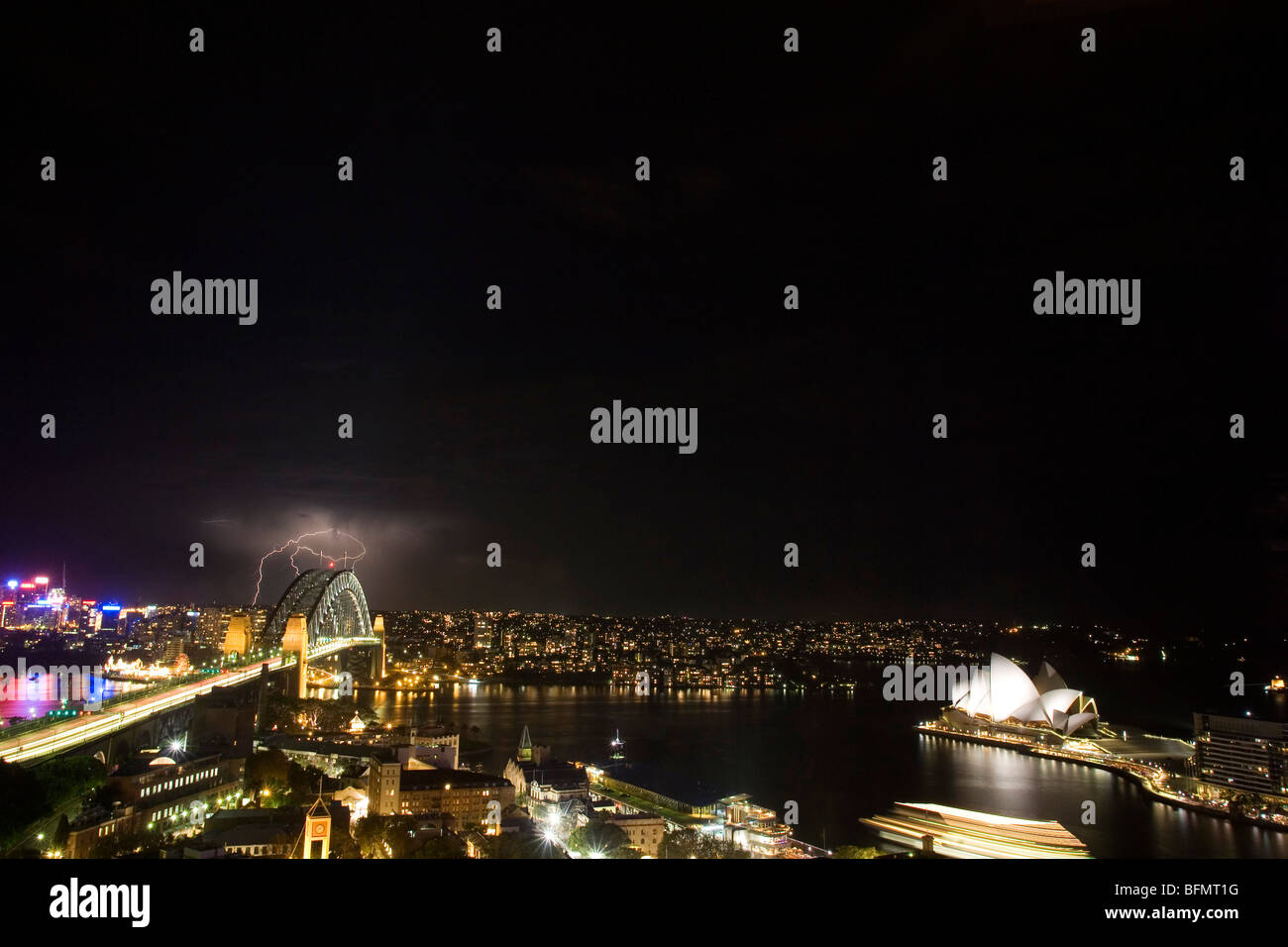 Sydney, Australia. The Opera House and Harbour Bridge illuminated at ...