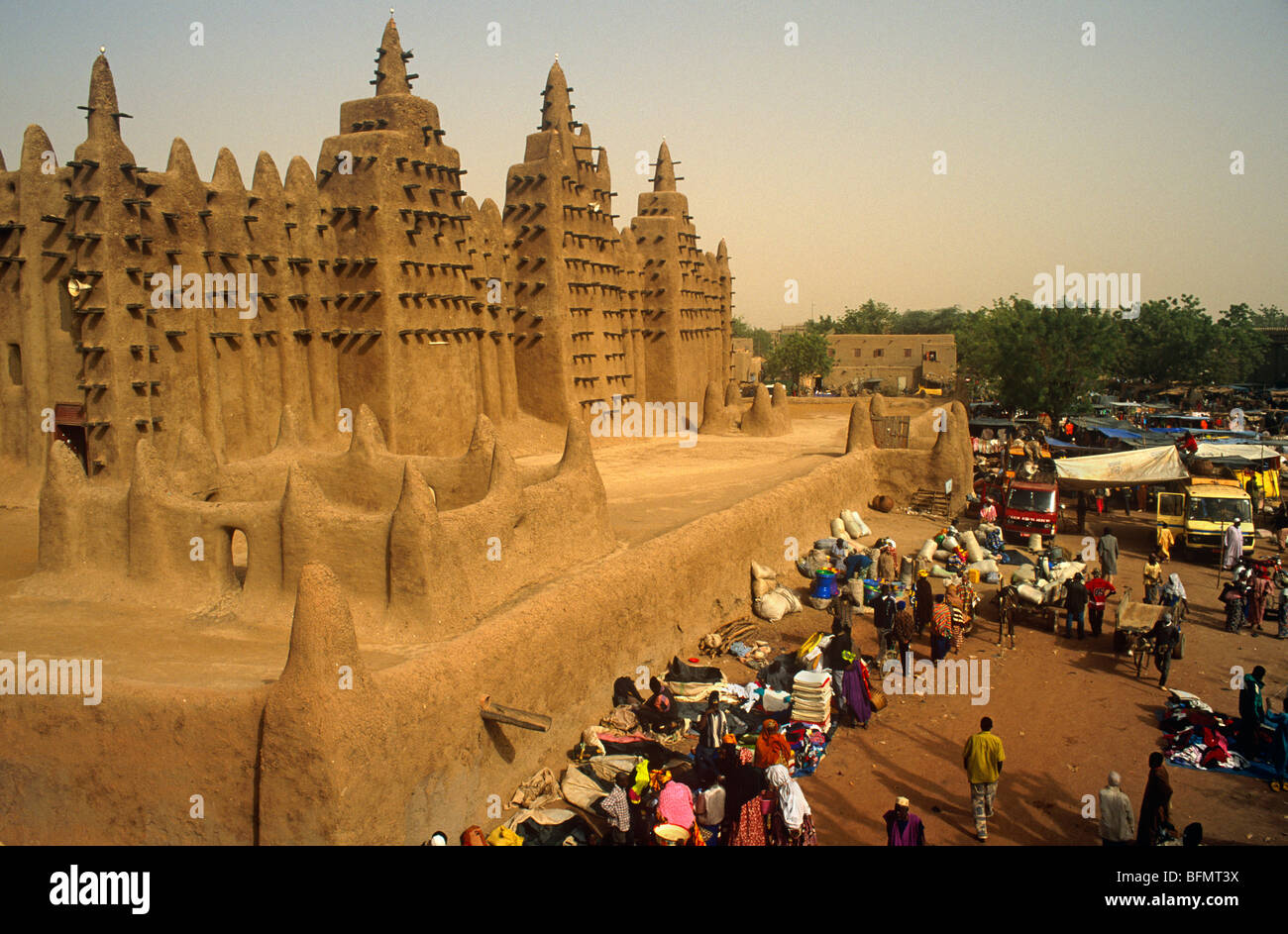 Mali, Djenne. Market stalls beside the Mosque of Djenne, or Grande ...