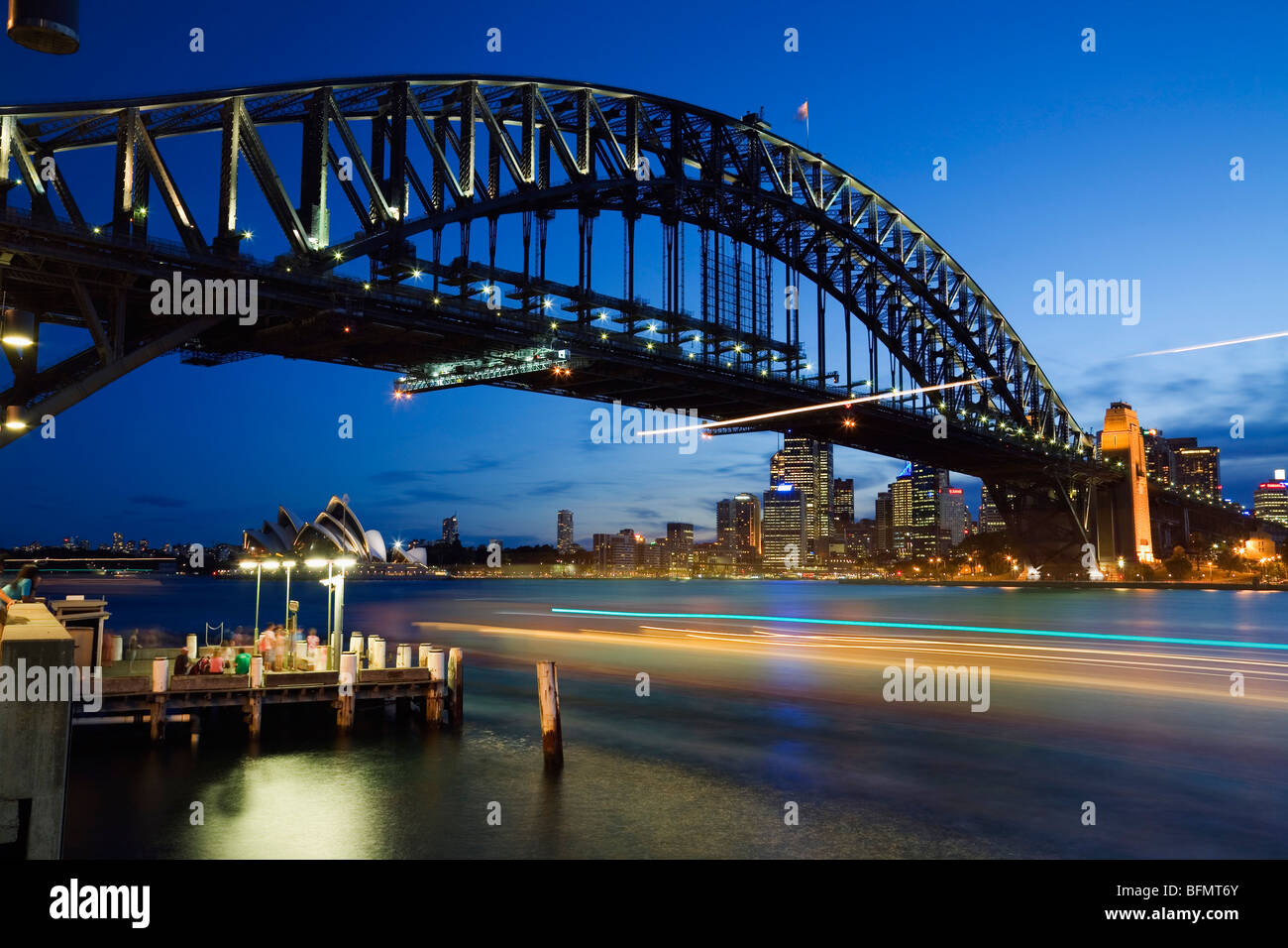 Australia, New South Wales, Sydney. Light trails from a ferry on Sydney ...