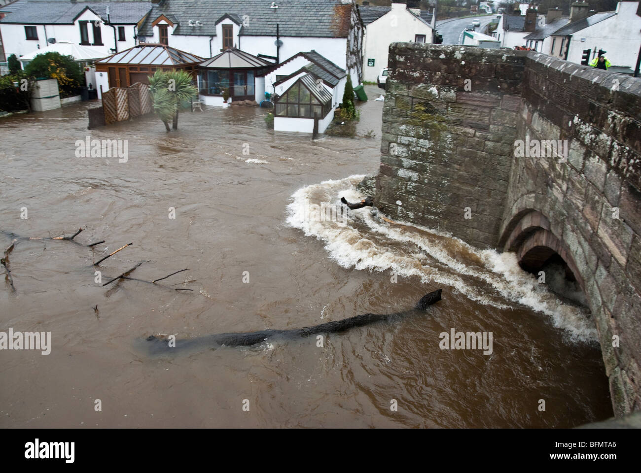 The River Eamont flooding houses at Eamont Bridge, Penrith, Cumbria ...