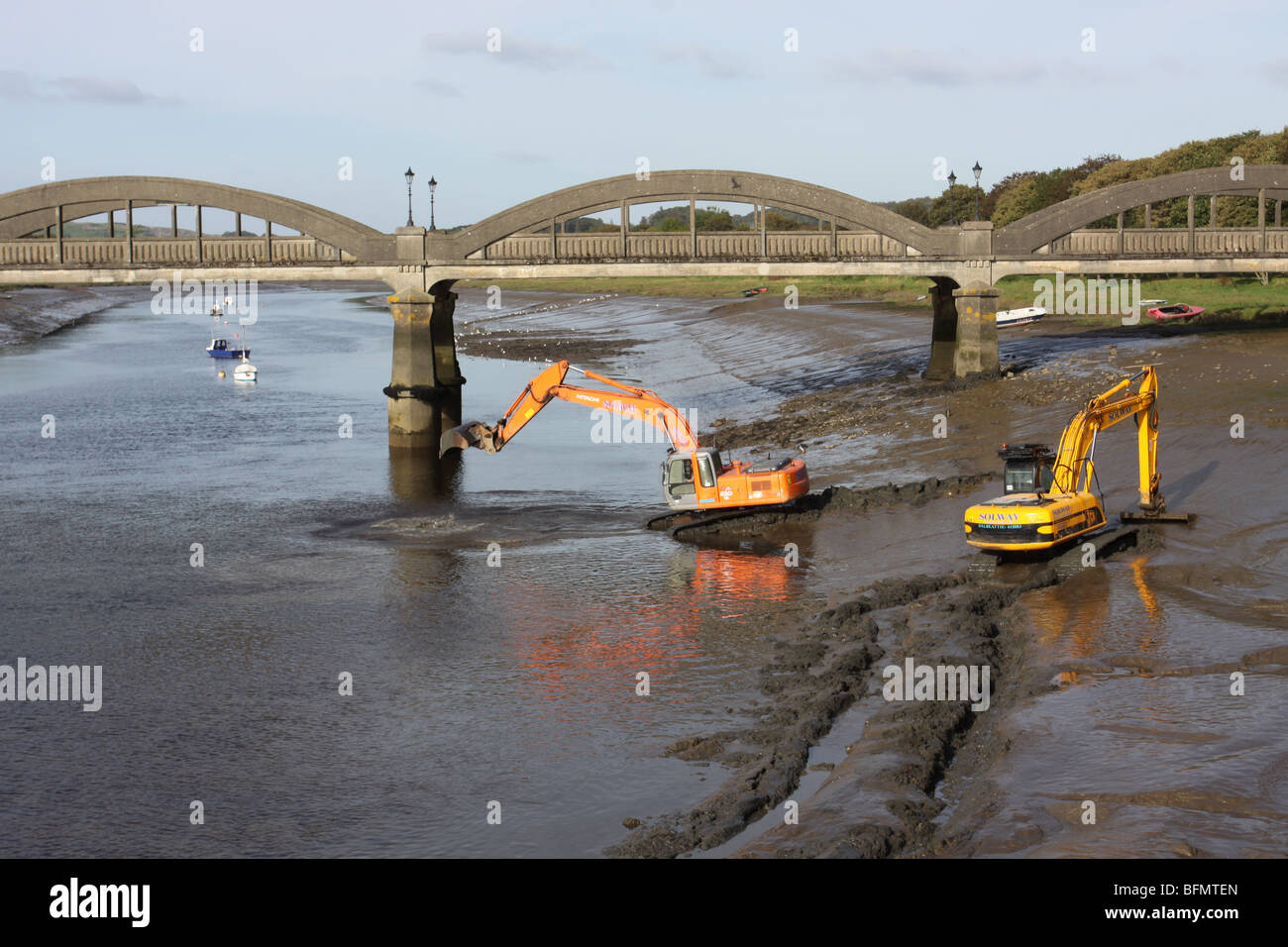 two hydraulic excavators in River Dee Kirkcudbright, Dumfries and ...