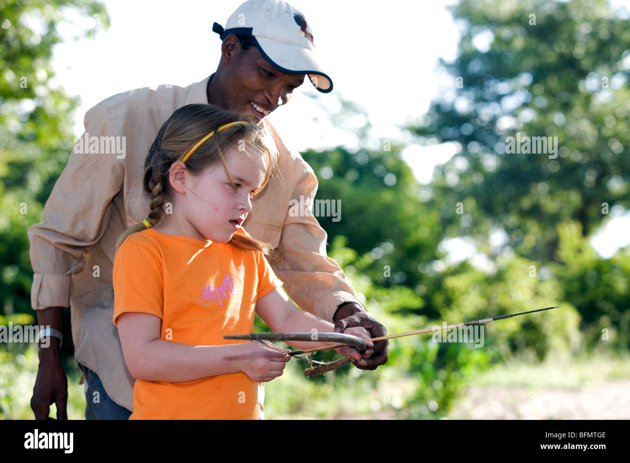 Nhoqma village, Bushmanland, Namibia .Ecotourism project, a young girl ...