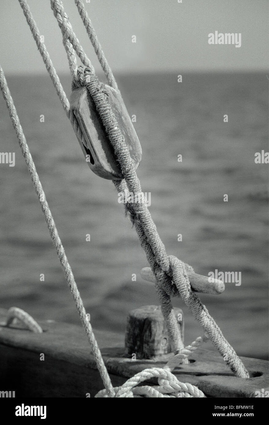 Oman. Traditional hemp rope and wooden pulley on the rigging of a ...