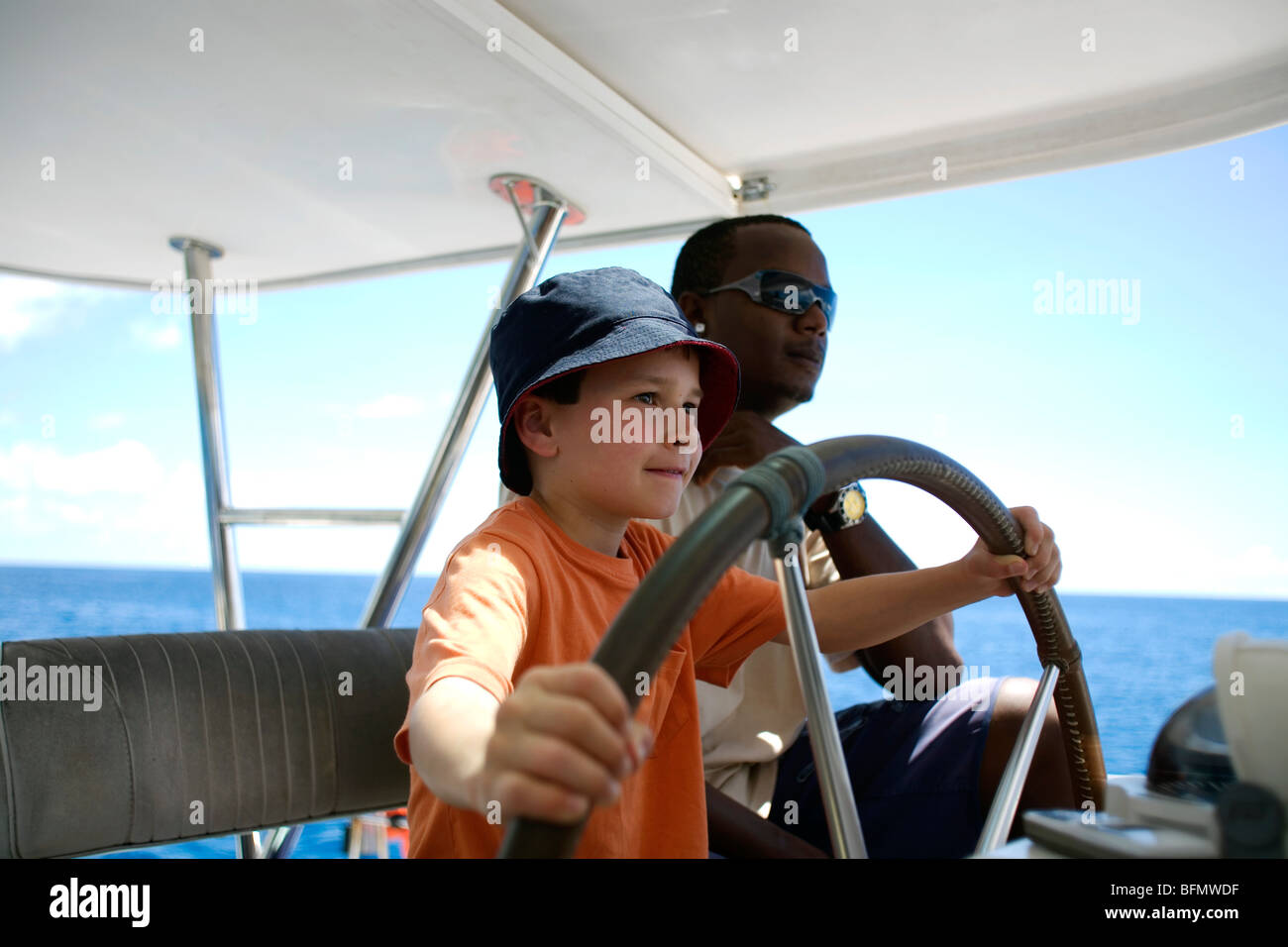 Skipper yacht takes wheel hi-res stock photography and images - Alamy