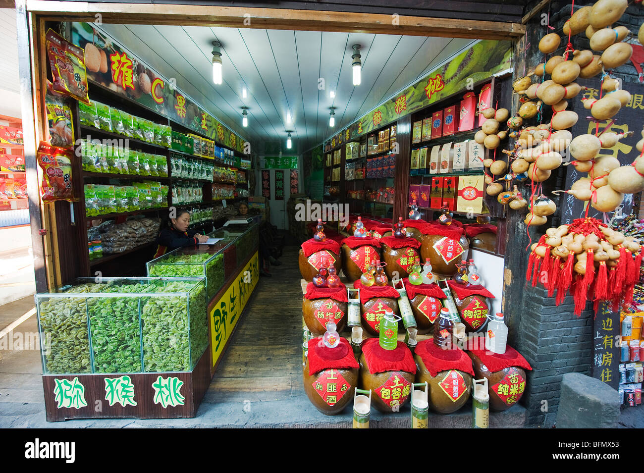 China, Hunan Province, Fenghuang, souvenir shop selling kiwi fruit and ...