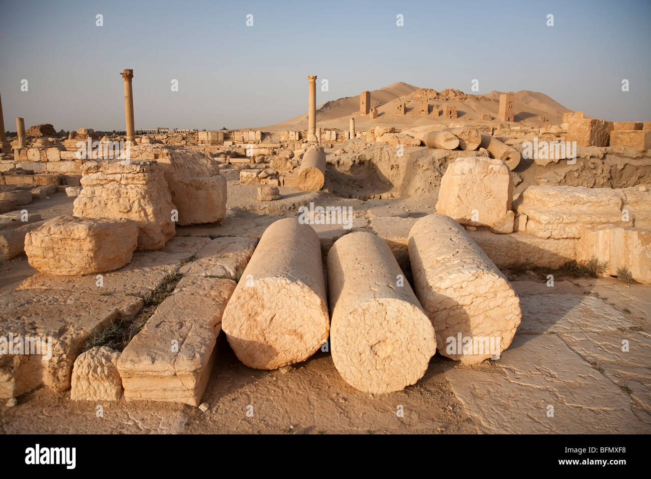 Syria, Palmyra. Fallen columns and arches litter the ground across the ...