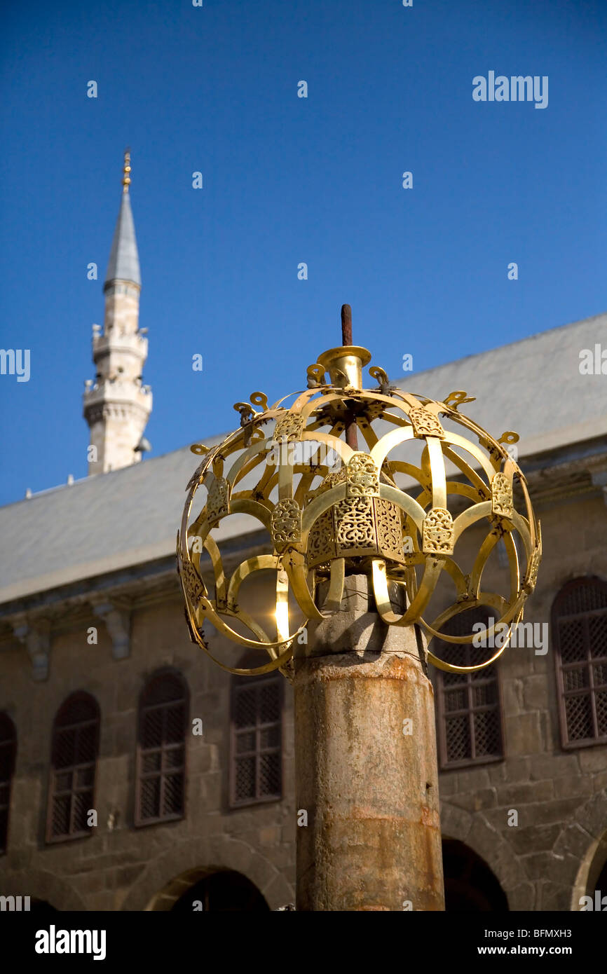 Syria, Damascus, Umayyad Mosque. A bronze decoration stands in the ...