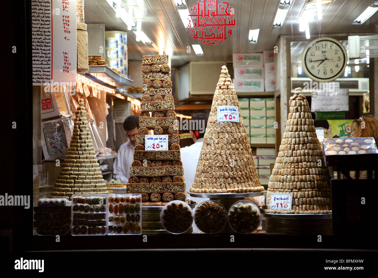 Syria, Damascus. Baclava and other Syrian pastries and treats piled ...