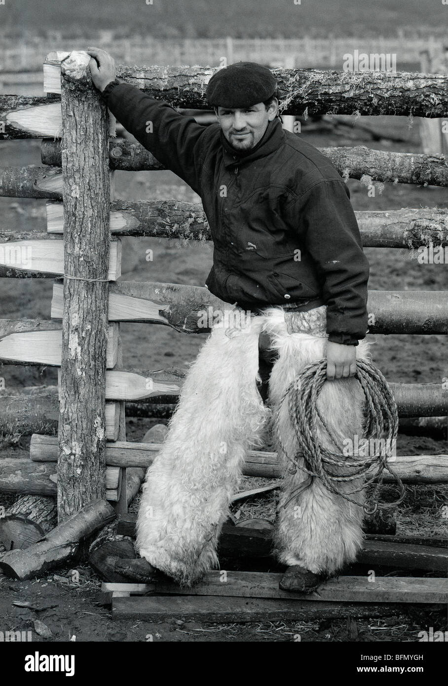 Chile, Patagonia. A Chilean cowboy or huaso wearing sheepskin chaps ...