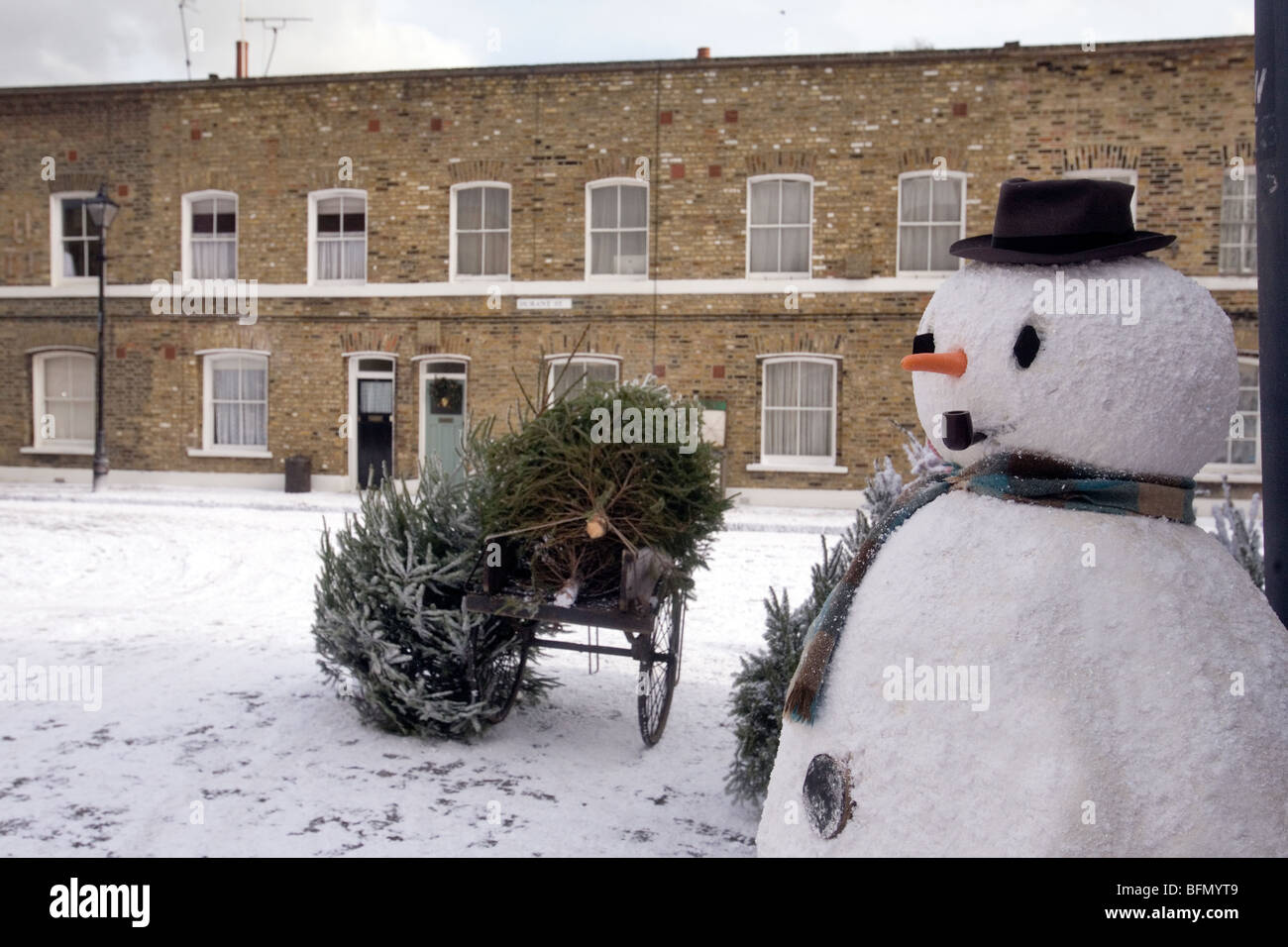 a snowman on an east end of london street Stock Photo - Alamy
