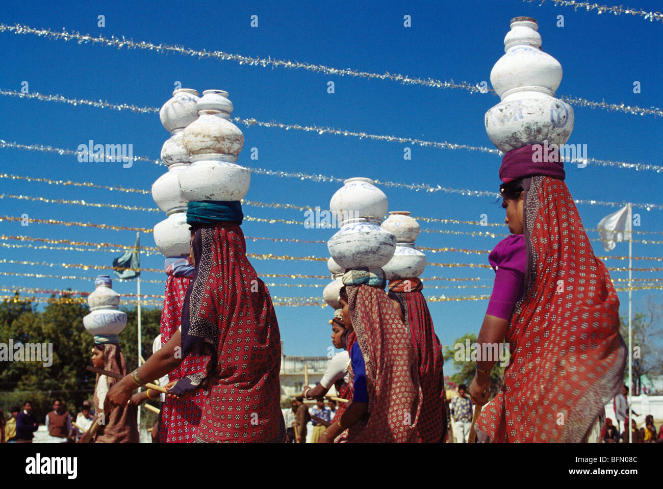 India rajasthan dungarpur women carrying pots on hi-res stock ...