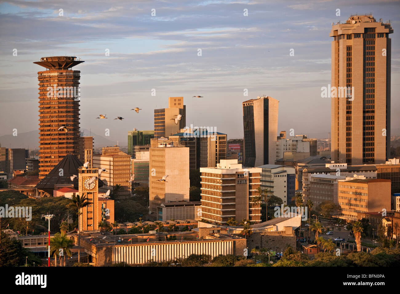 Kenya, Nairobi. Nairobi skyline bathed in late afternoon sunlight as a ...