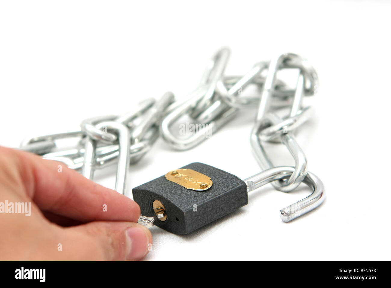 Cutout of a Man's hand chained and locked on white background Stock ...