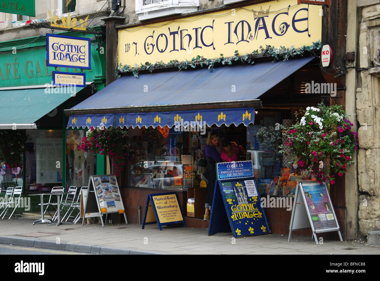 Colourful shop front in Glastonbury High Street Somerset England Stock ...