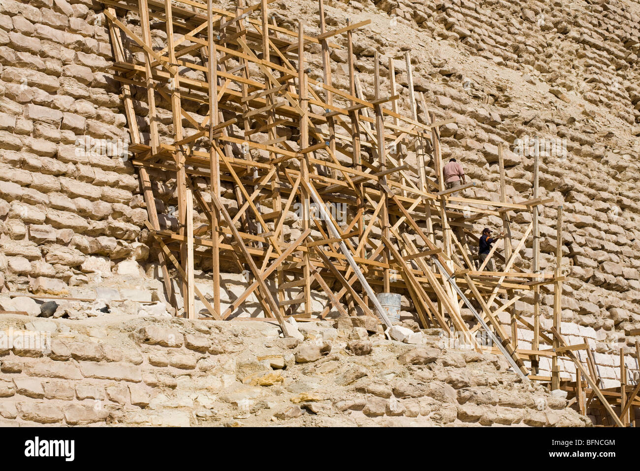 Restoration work at the Step Pyramid of Pharaoh Djoser at Sakkara, near ...