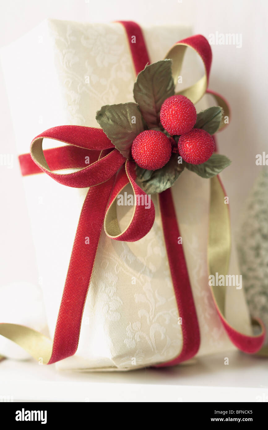 White gift on Mantle Stock Photo - Alamy
