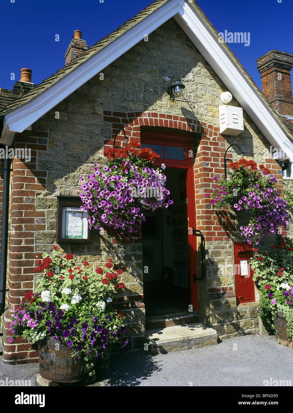 Fernhurst, West Sussex, England, UK. Village Post Office with flowers ...