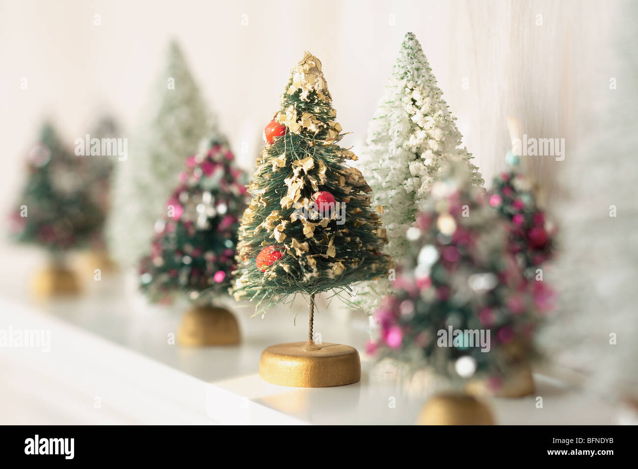 Mantle of Christmas Trees Stock Photo - Alamy