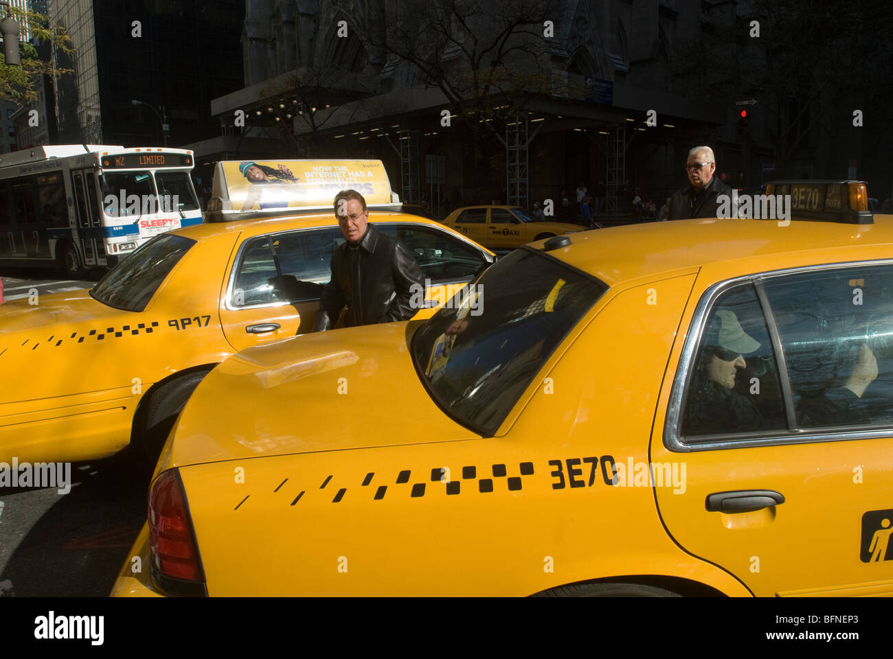 Pedestrians maneuver through gridlocked traffic on Fifth Avenue in New ...