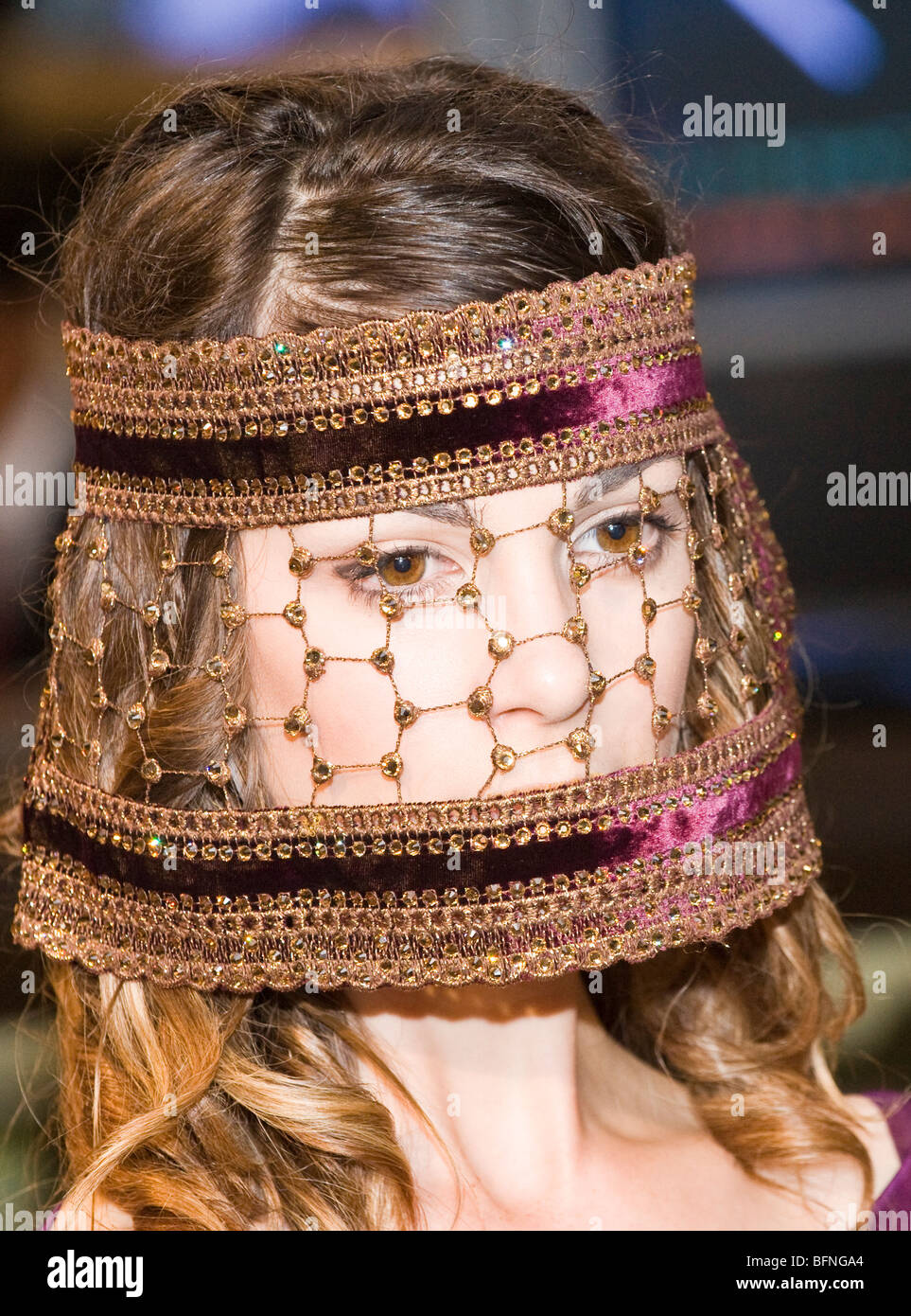 Model wearing original embroidered and mesh mask presented at the Saudi ...