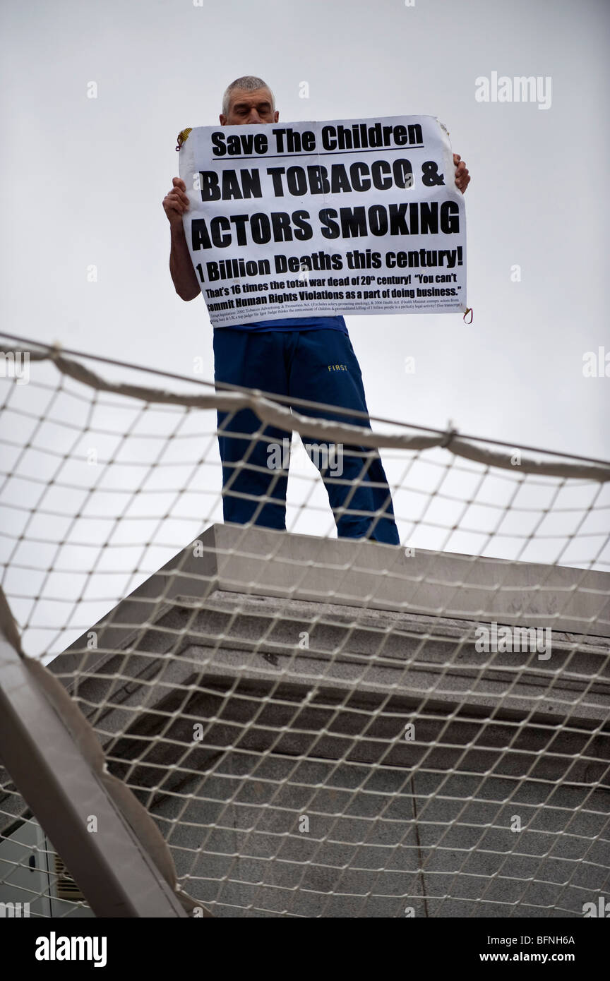 A man holding a banner as part of Antony Gormley's Fourth Plinth ...