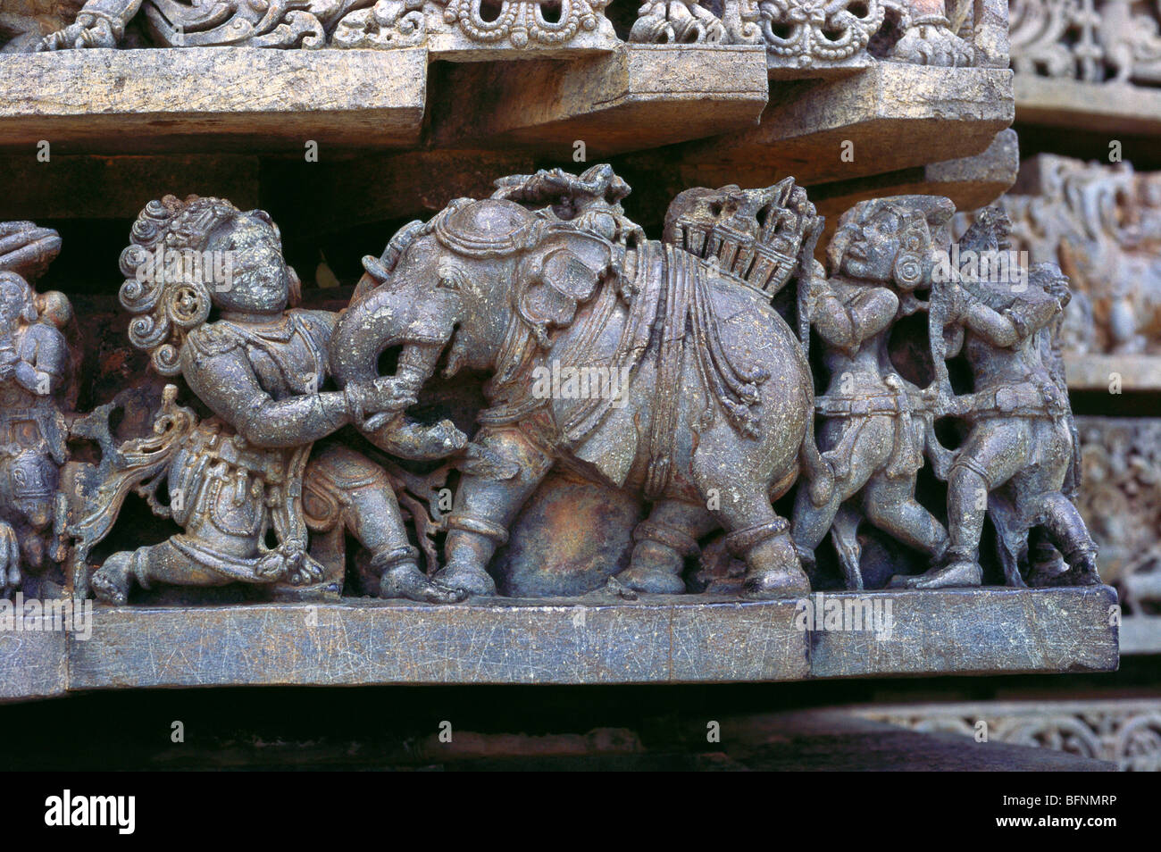 Mahabharata ; Bhima killing elephant sculpture ; Hoysaleswara temple ...