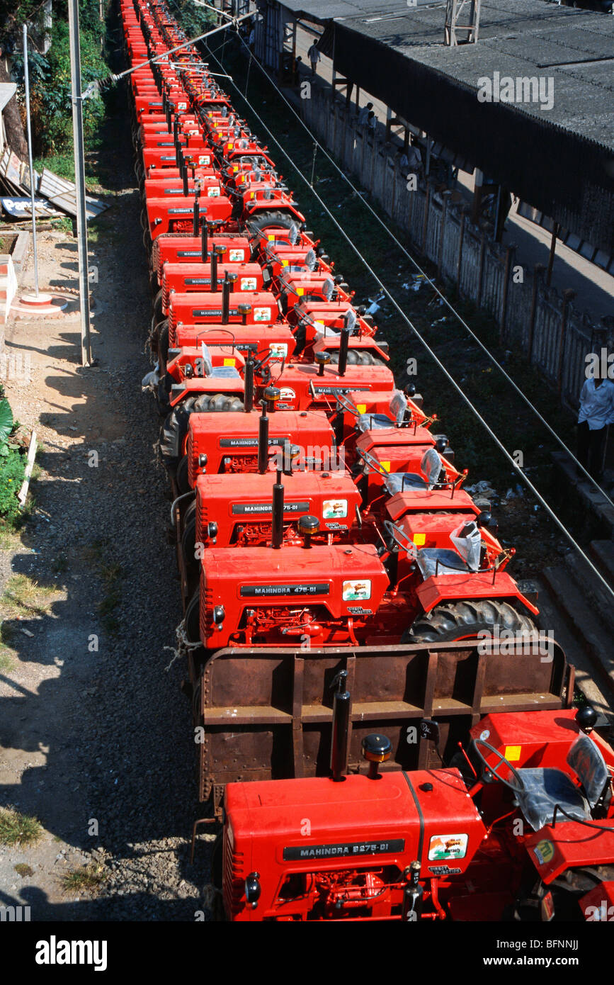 Tractors transport on freight train ; India ; asia Stock Photo - Alamy