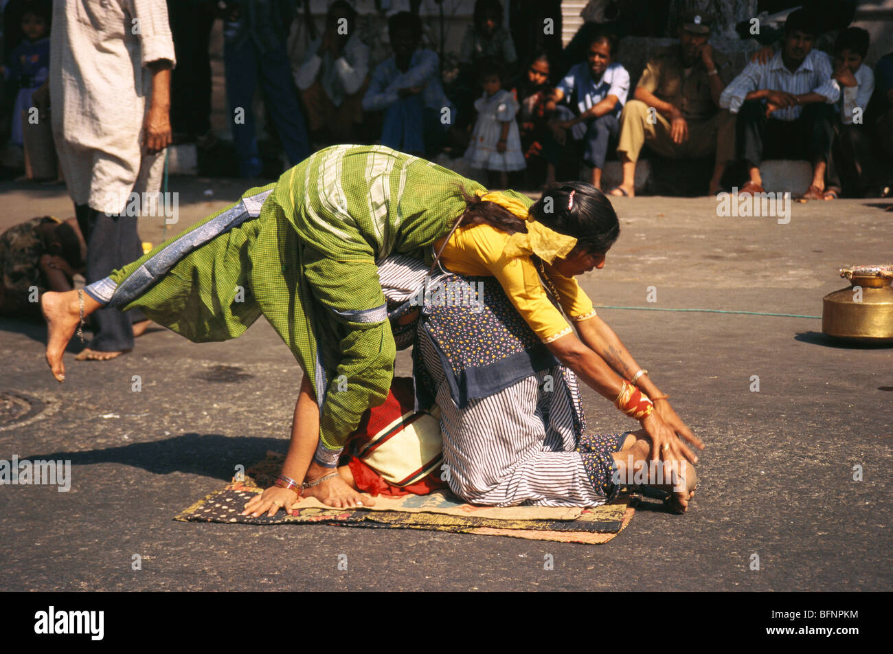 Indian women street Acrobatics ; Bombay ; Mumbai ; Maharashtra ; India ...