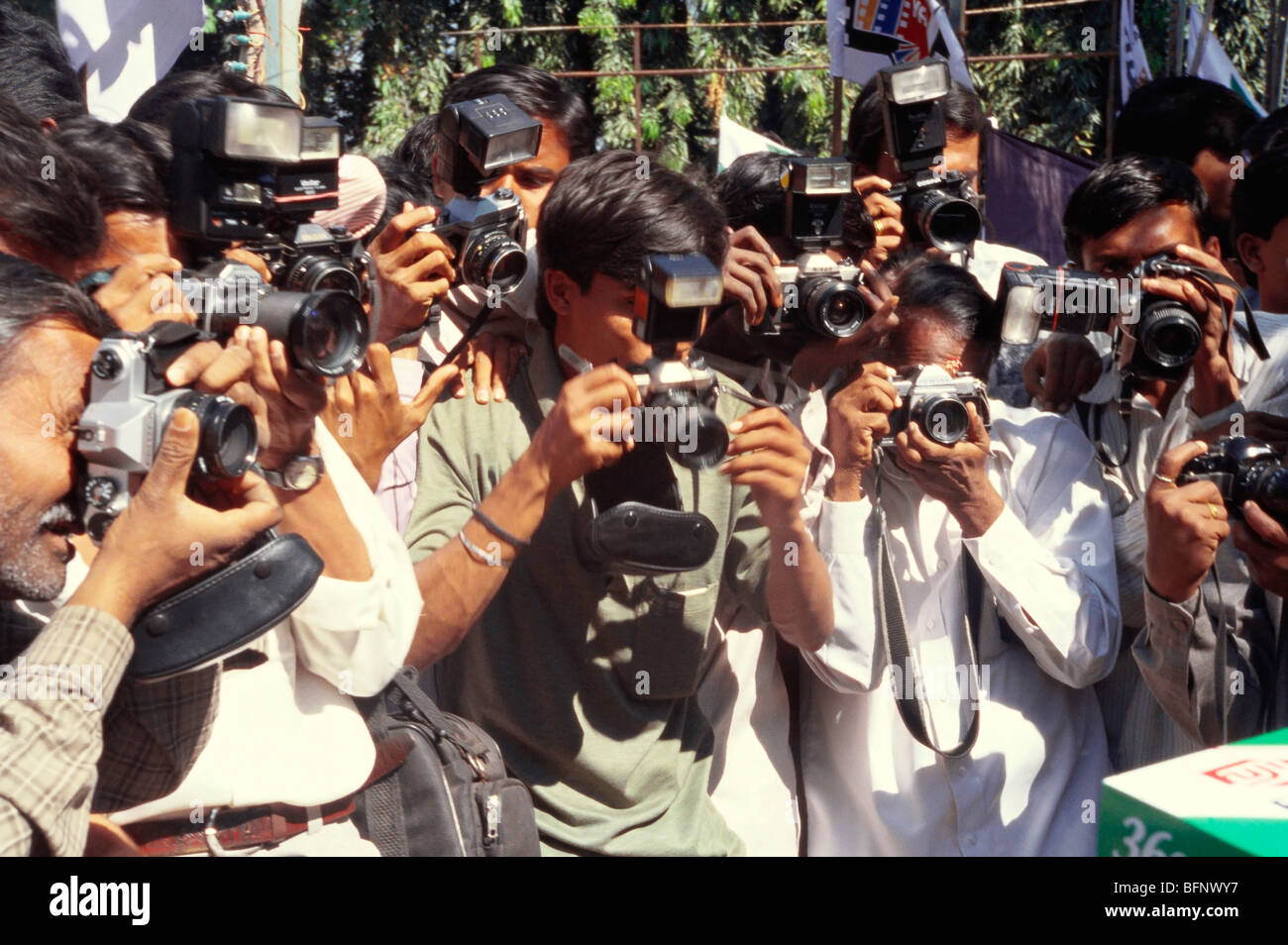 Photographers with cameras crowded ; india ; asia Stock Photo - Alamy