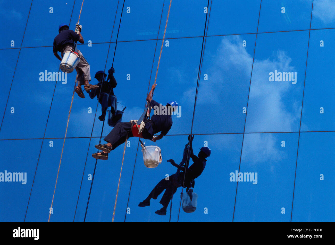 Window glass cleaners ; Bombay ; Mumbai ; Maharashtra ; India ; asia ...