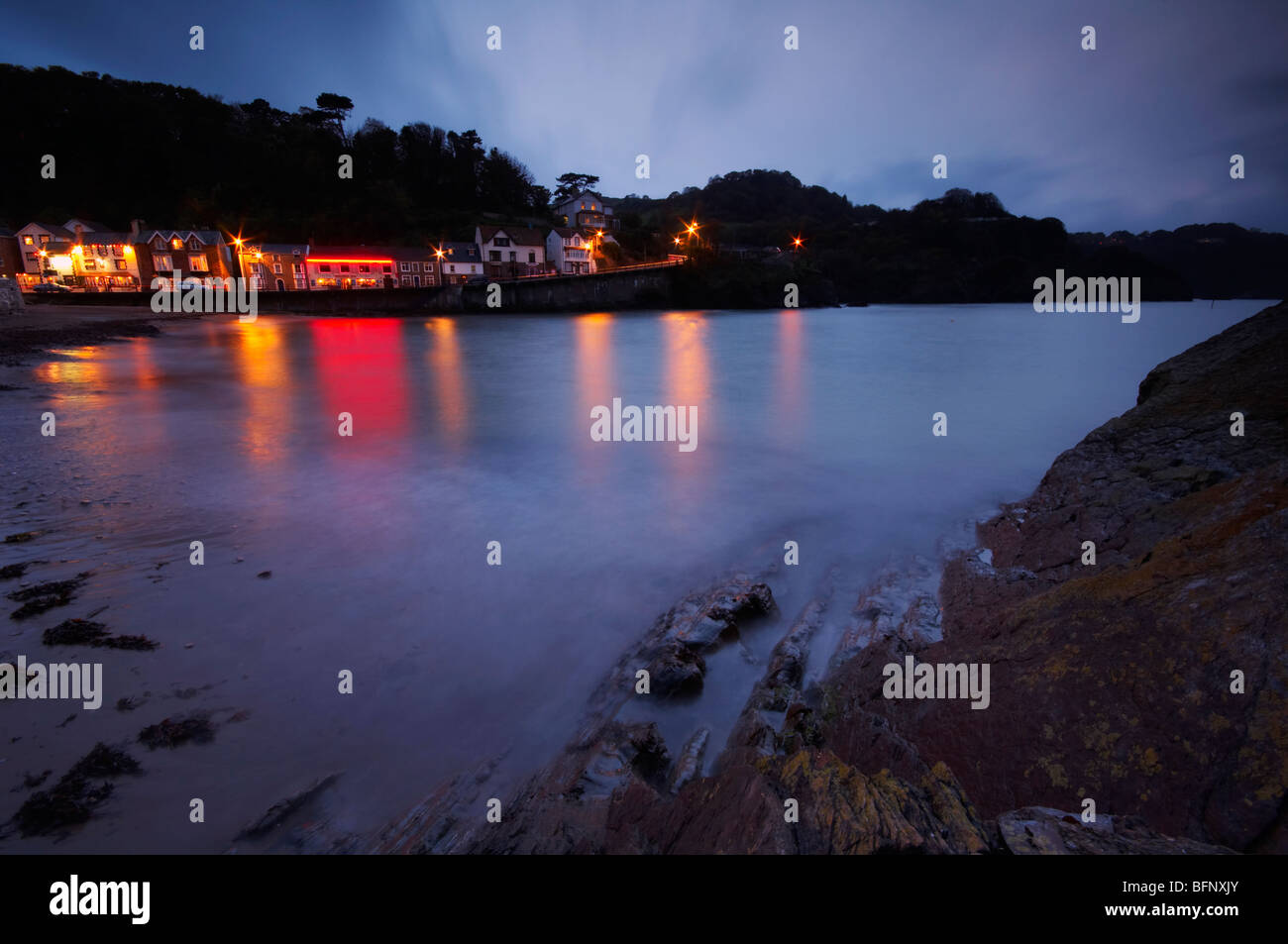 High tide at dusk at Coombe Martin bay on the North Devon coast UK ...