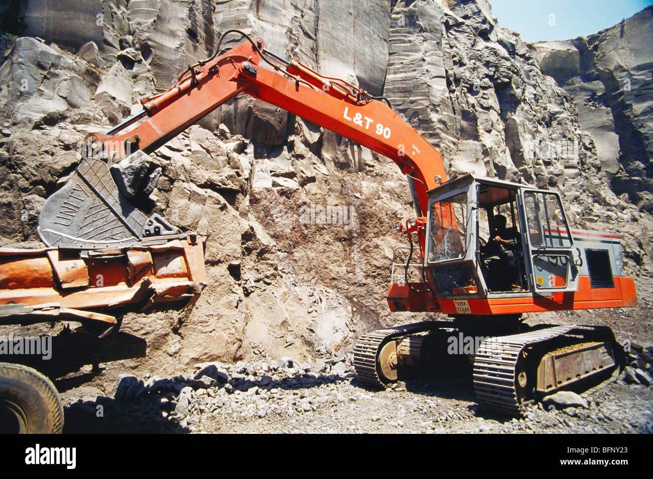 Earthmover at dam site ; India ; asia Stock Photo - Alamy